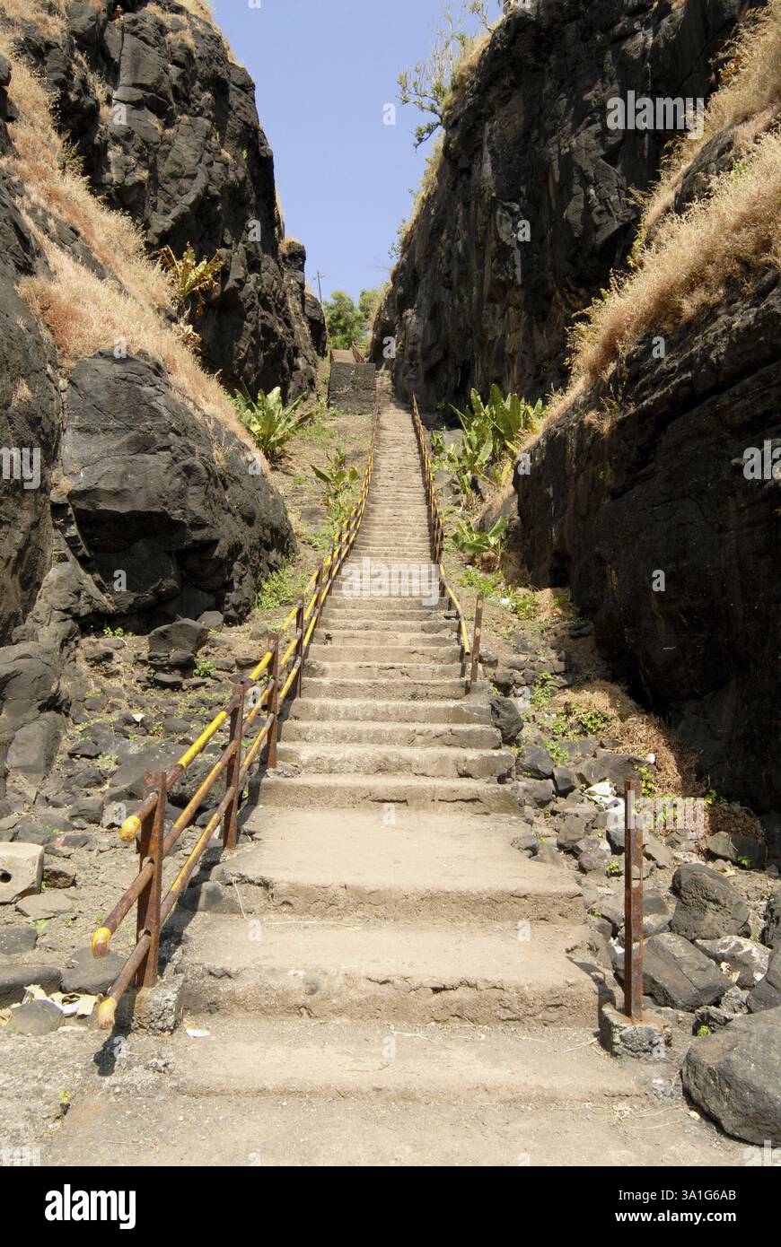 Huge boulder split in to half and steps towards Harihareshwar Beach ...