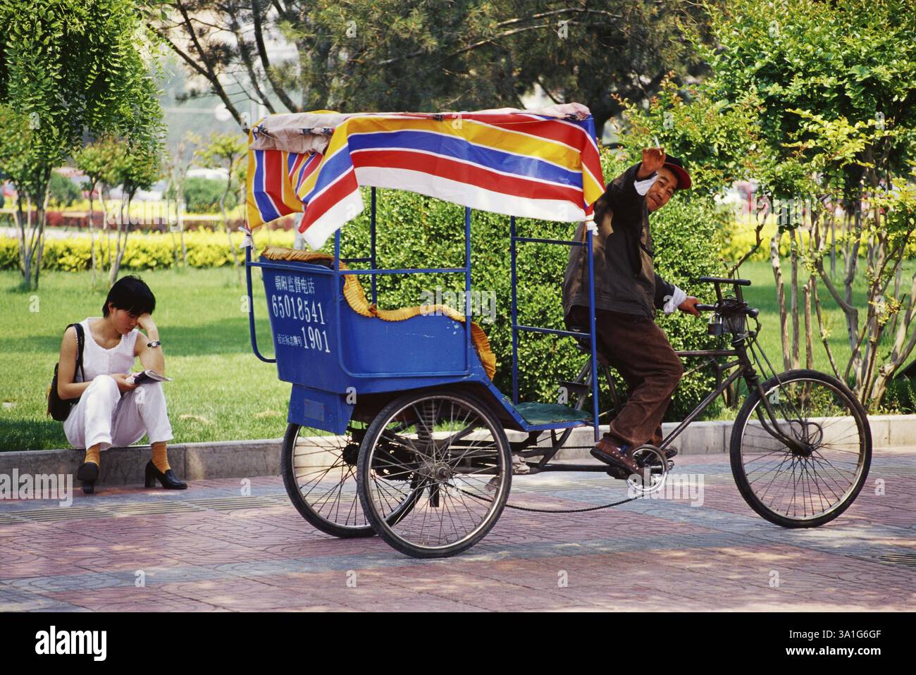 A rickshaw puller in the park, China, Asia Stock Photo - Alamy