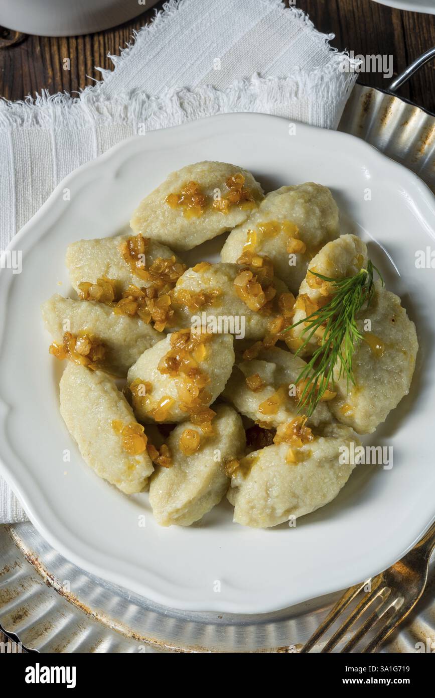 Silesian grey potato dumplings Stock Photo - Alamy