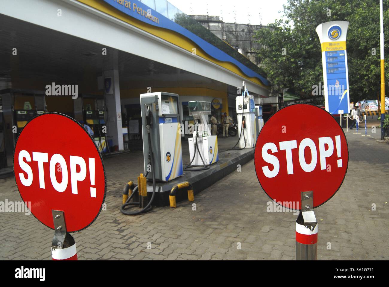 A stop sign preventing vehicles to fill their fuel tanks as petrol pump ...