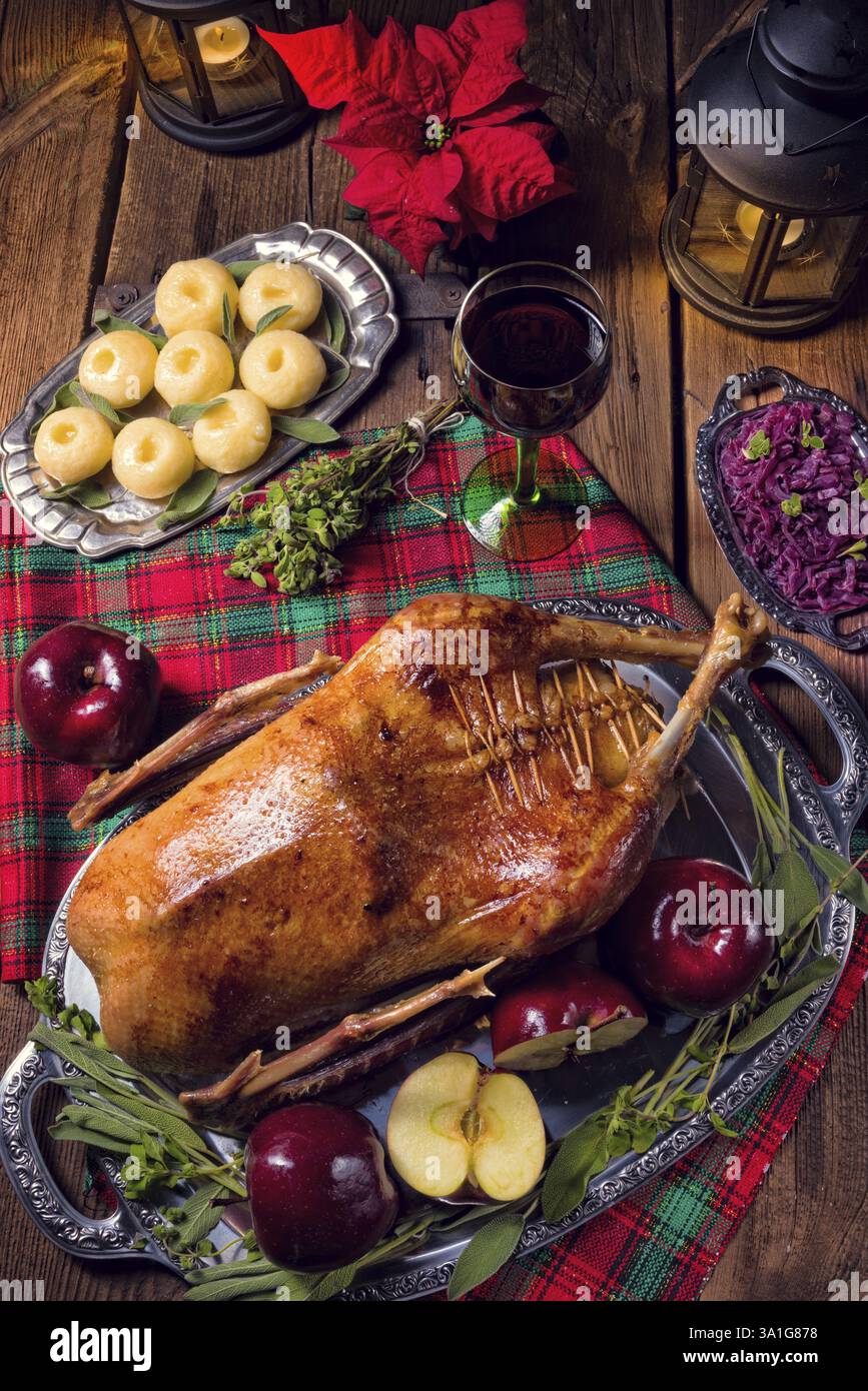Roast Christmas duck with apples Stock Photo - Alamy