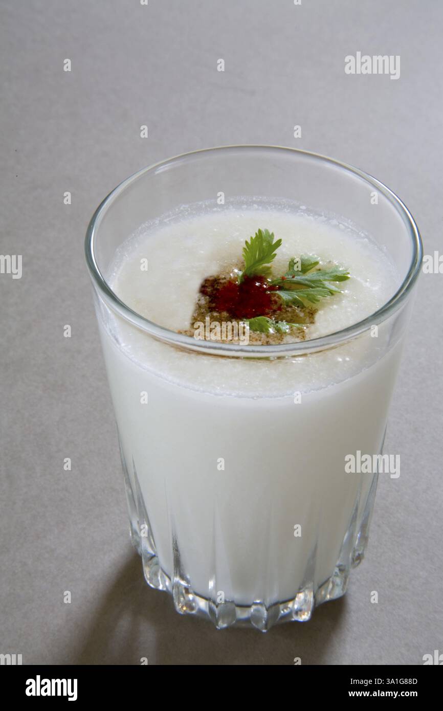 Butter milk masala chaas made from full cream milk into yogurt home or ...