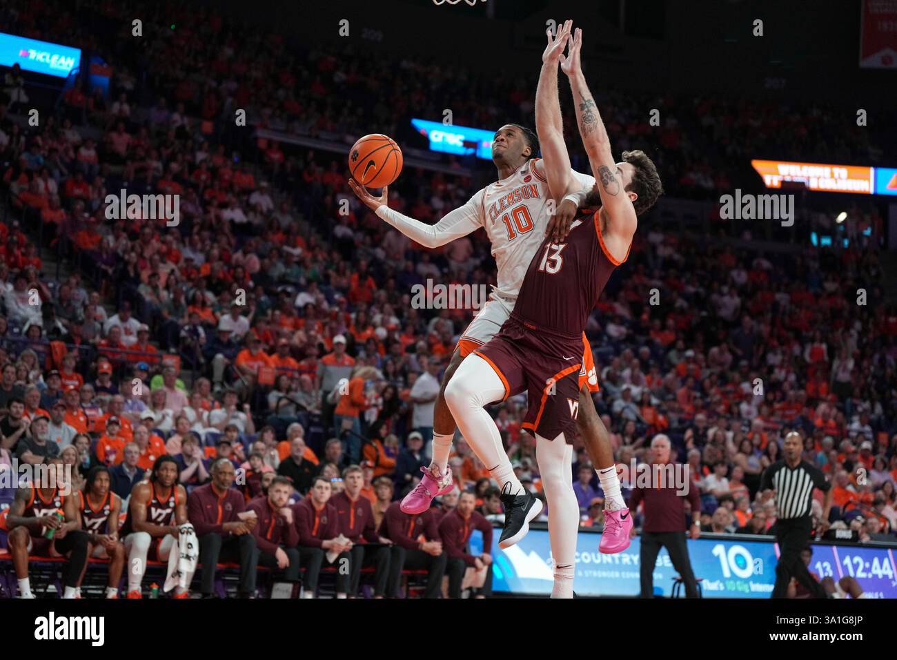 Clemson guard Del Jones (10) is defended by Virginia Tech forward Ben ...