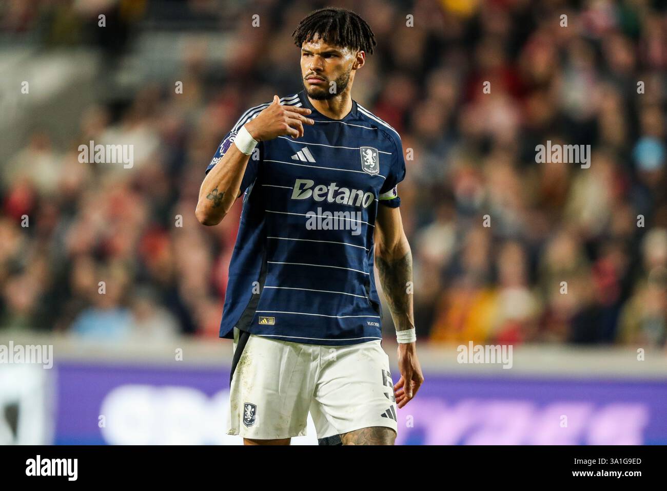 London, UK. 08th Mar, 2025. Tyrone Mings of Aston Villa reacts during ...