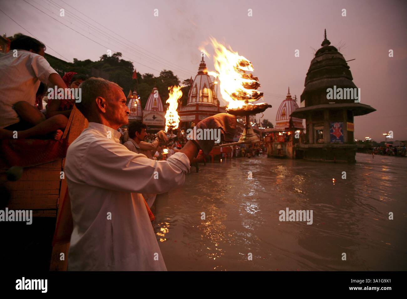 Priests carrying the holy aarti during the prayers, Har Ki Pauri ...
