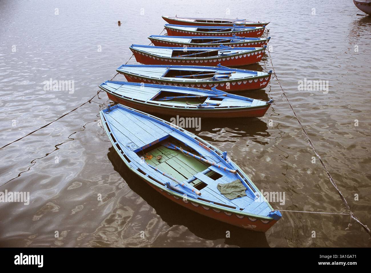 Wooden boats floating in ganga river, Varanasi, Uttar Pradesh, India ...