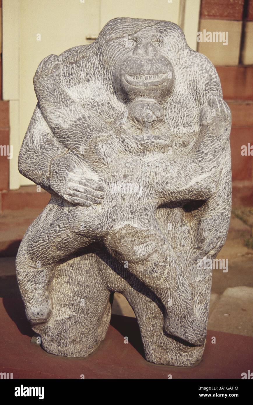 Sculpture gorilla and cub in stone outside modern art museum, New Delhi ...
