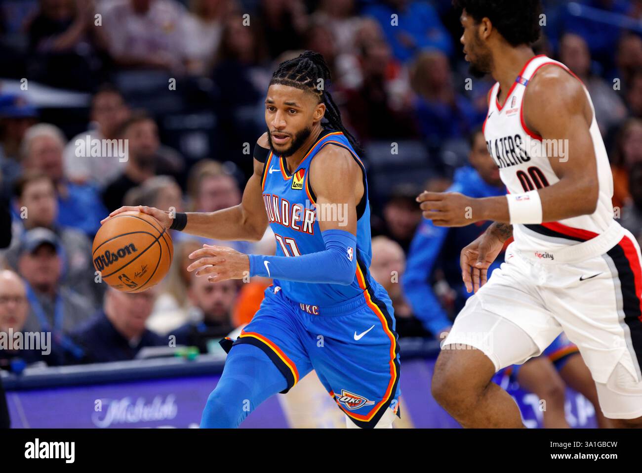 Oklahoma City Thunder guard Isaiah Joe, left, drives next to Portland ...