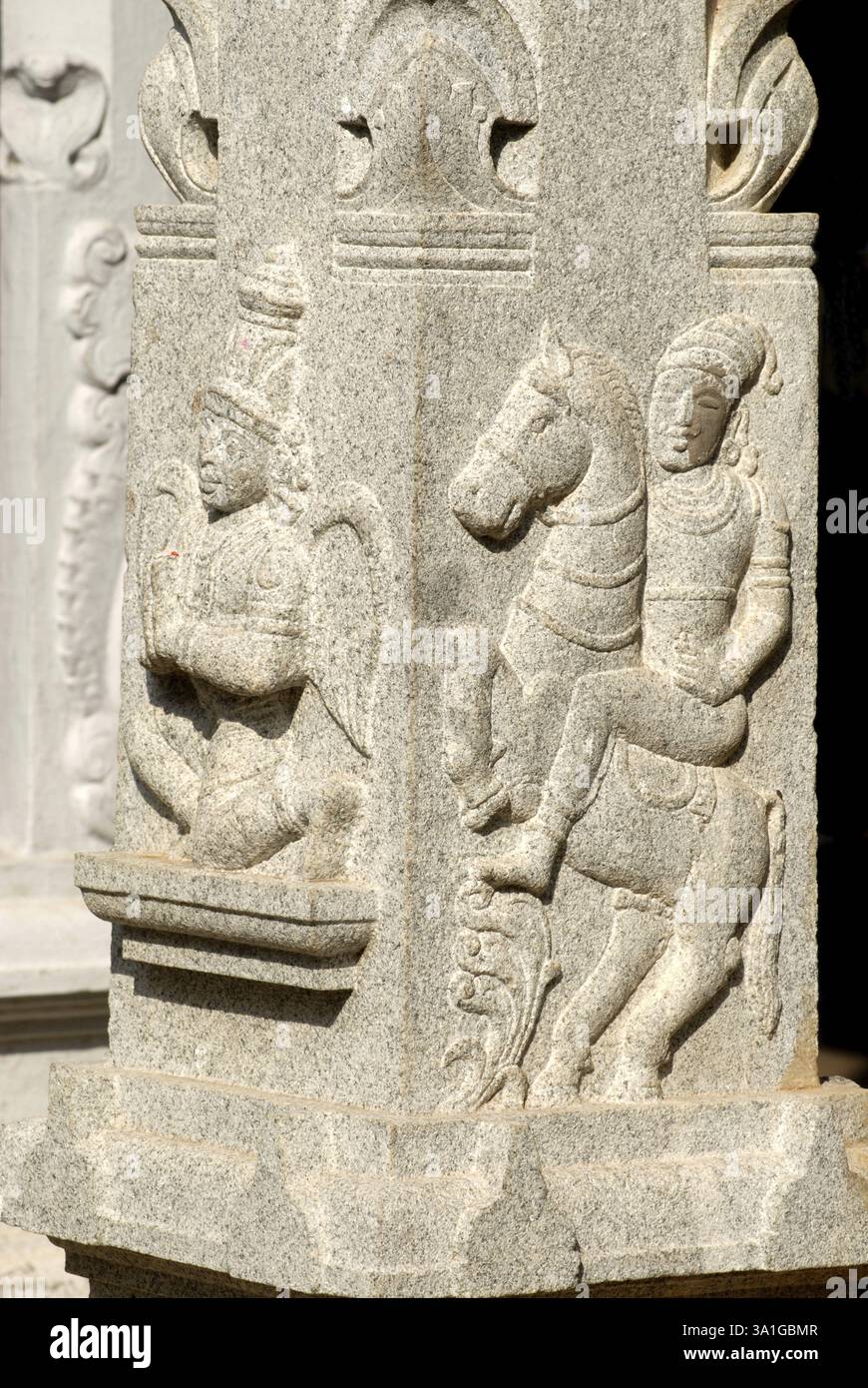 King Shivaji and Garuda, Richly stone carved pillar at the hoary shrine ...