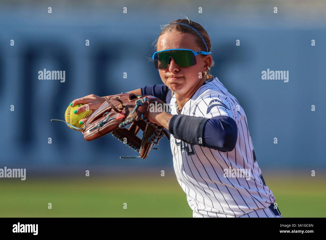 North Florida infielder Hadlee Reichert (33) warms up before an NCAA ...