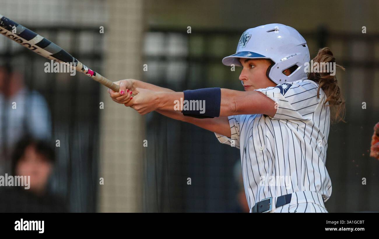 North Florida outfielder Chloe Culp (3) bats during an NCAA softball ...