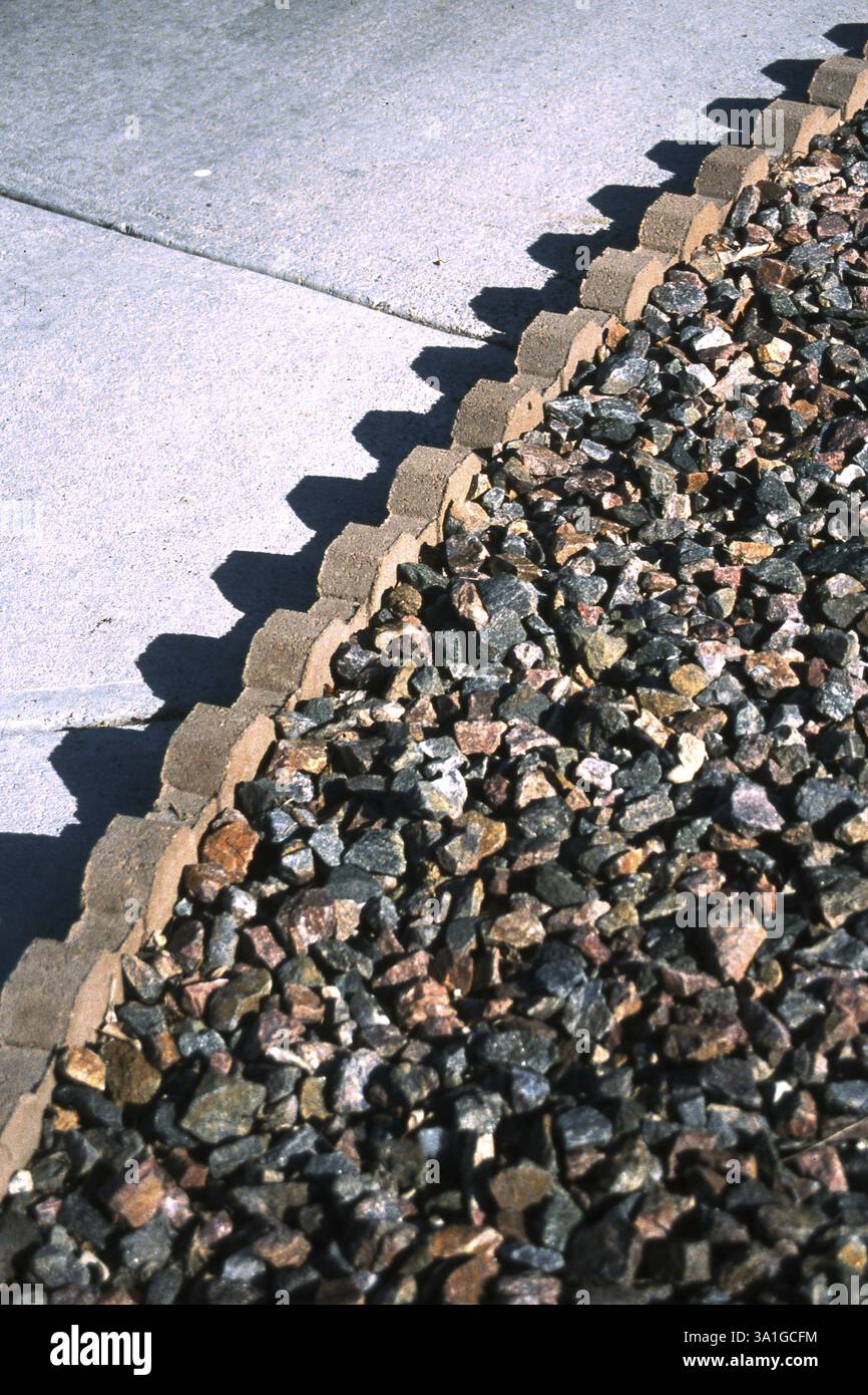 Shades of small boundary line made by bricks Stock Photo - Alamy