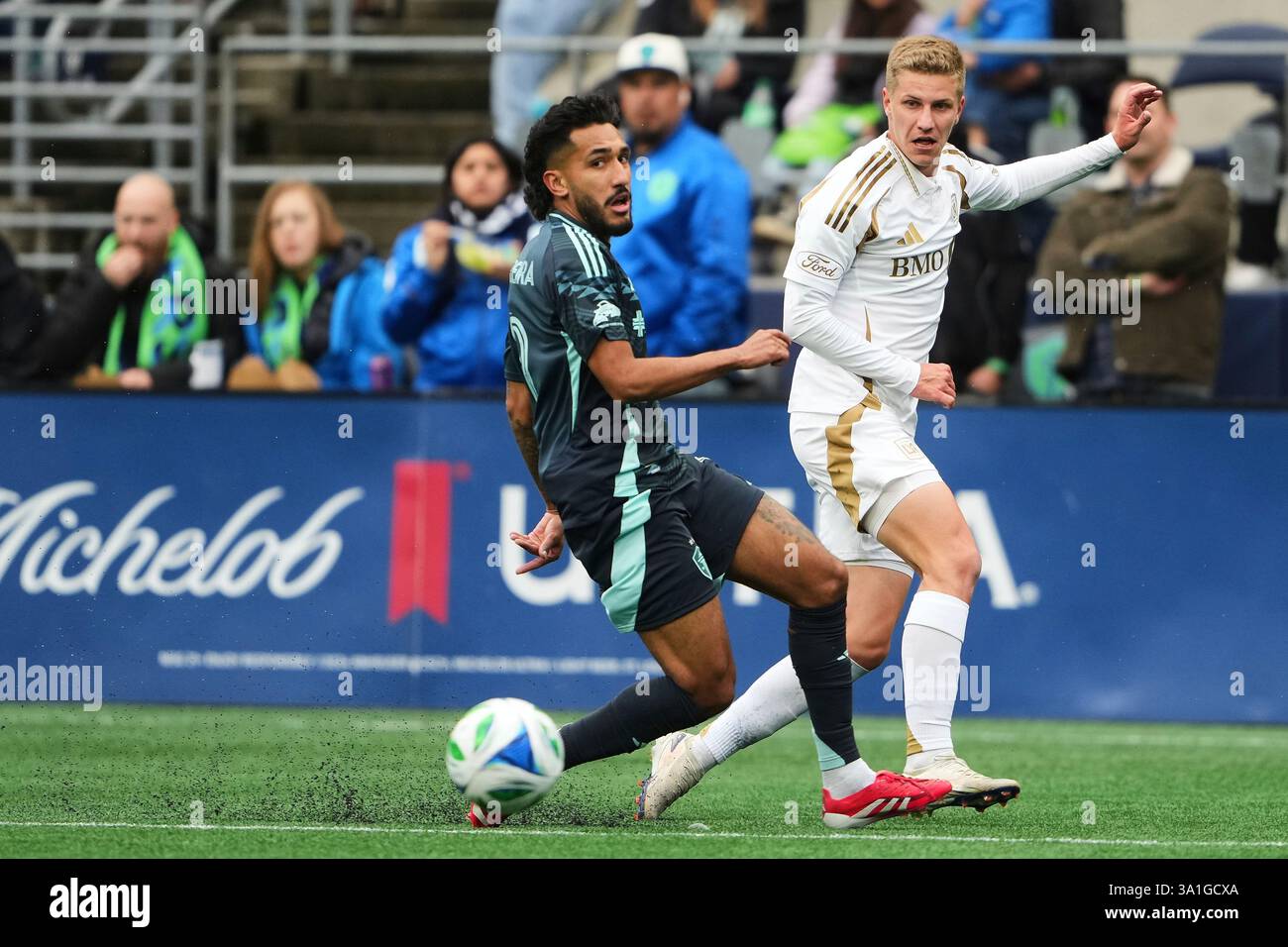 Seattle Sounders forward Jesús Ferreira, left, looks as Los Angeles FC ...