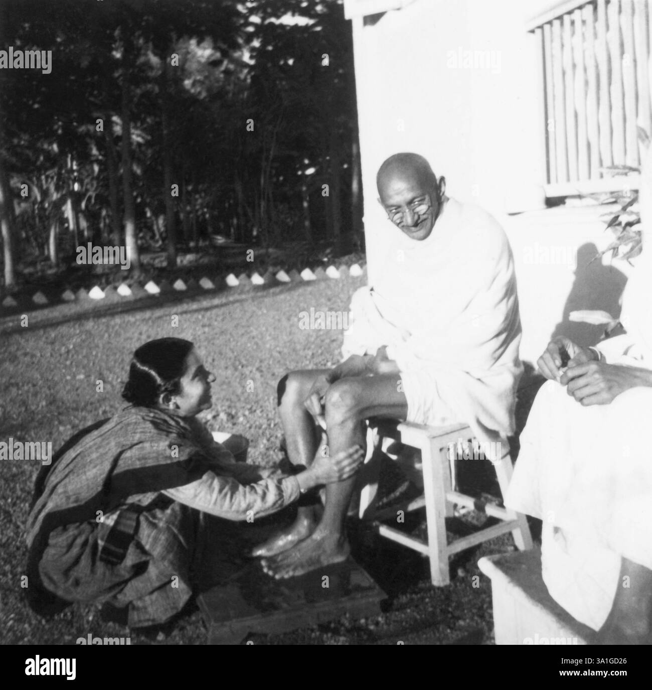 Ashramite Dr. Lilavatibehn Asha washing Mahatma Gandhi's feet at ...