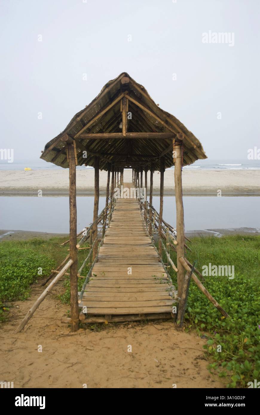Foot over bridge across mass water just before Mandarin beach, Goa ...