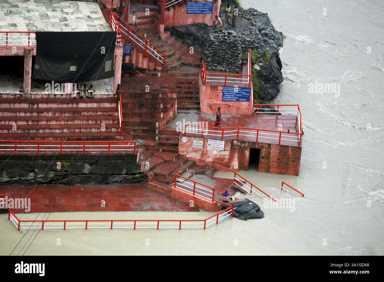 A temple at the confluence of the Alaknanda, the Bhagirathi where they ...
