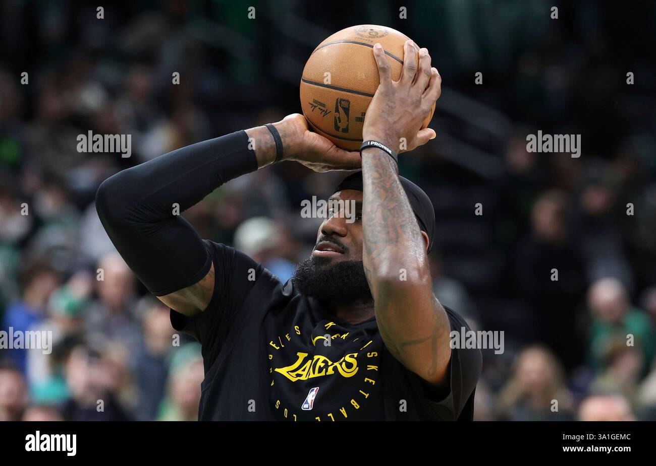 Los Angeles Lakers forward LeBron James warms up before an NBA ...