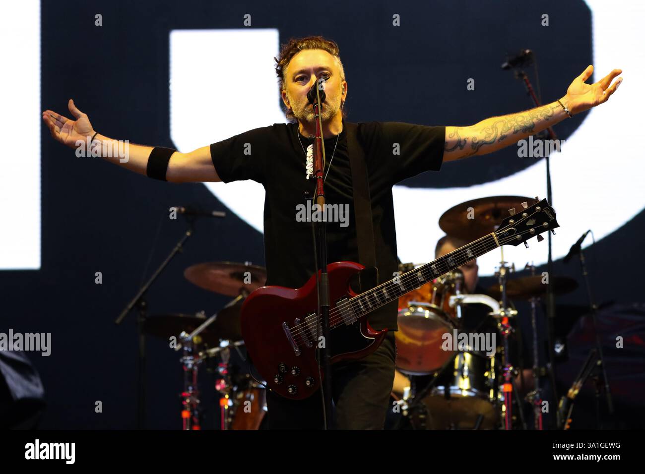 American band Rise Against, led by vocalist Tim Mcllrath during a ...