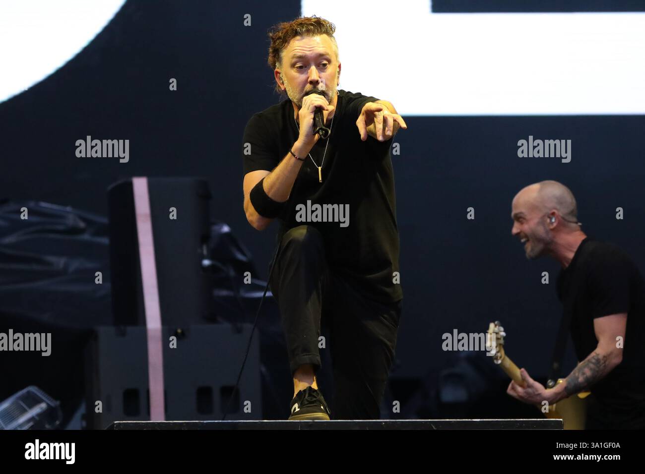 American band Rise Against, led by vocalist Tim Mcllrath during a ...