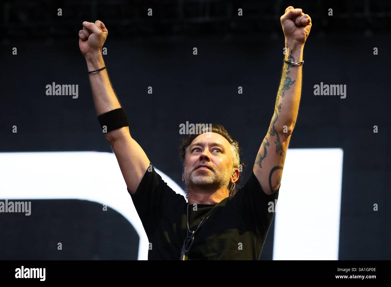American band Rise Against, led by vocalist Tim Mcllrath during a ...