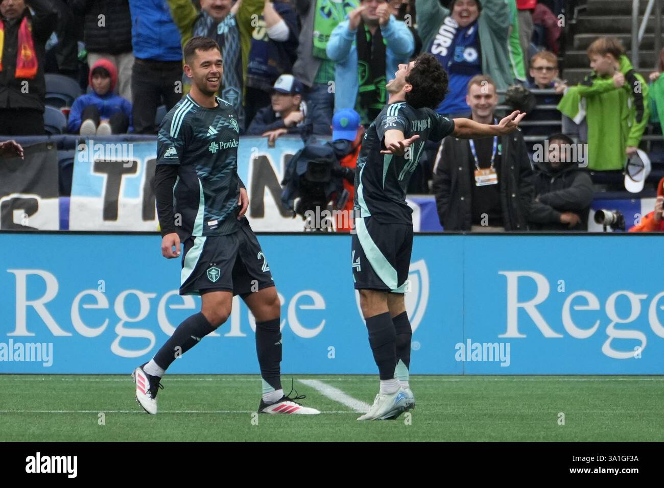 Seattle Sounders FC Forward Paul Rothrock (14) celebrates his goal with ...