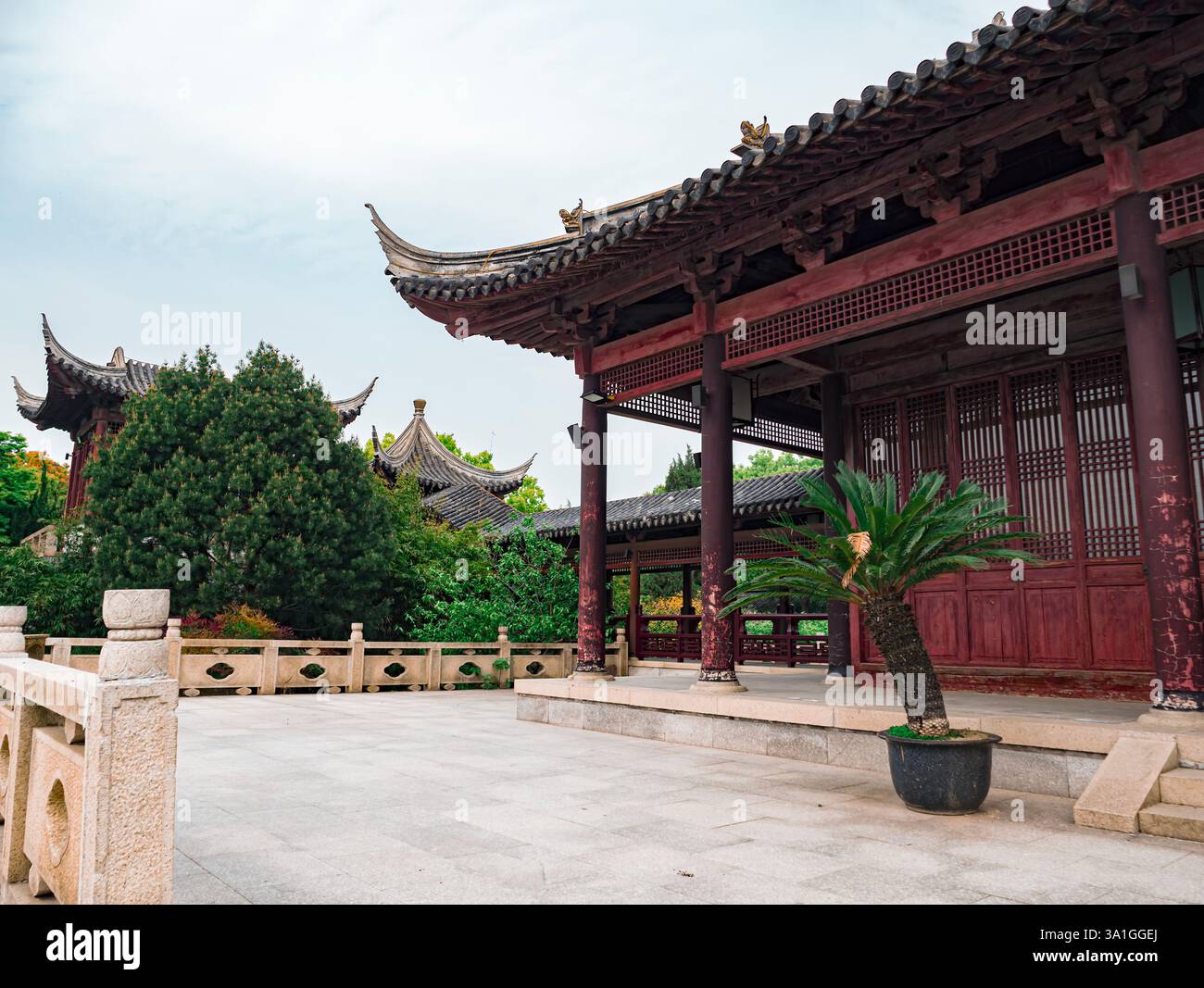 Traditional chinese architecture showcases serene courtyard and lush ...
