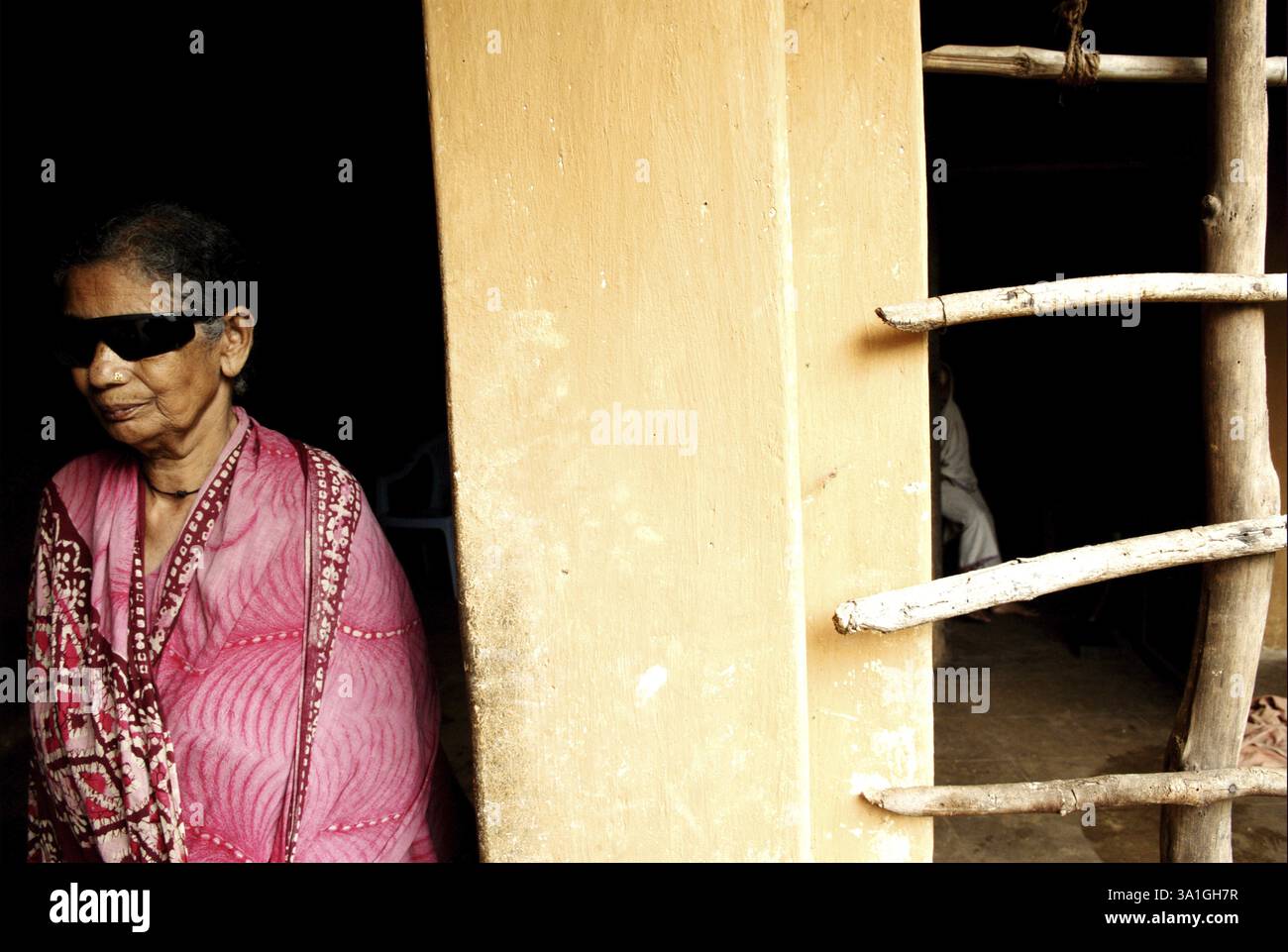 Rural old woman wearing black goggles, Ngo Patang, Sambalpur, Orissa ...