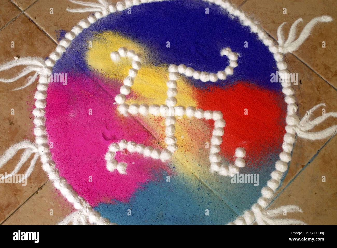 Swastika symbol of sun god colourful rangoli designs drawn with ...