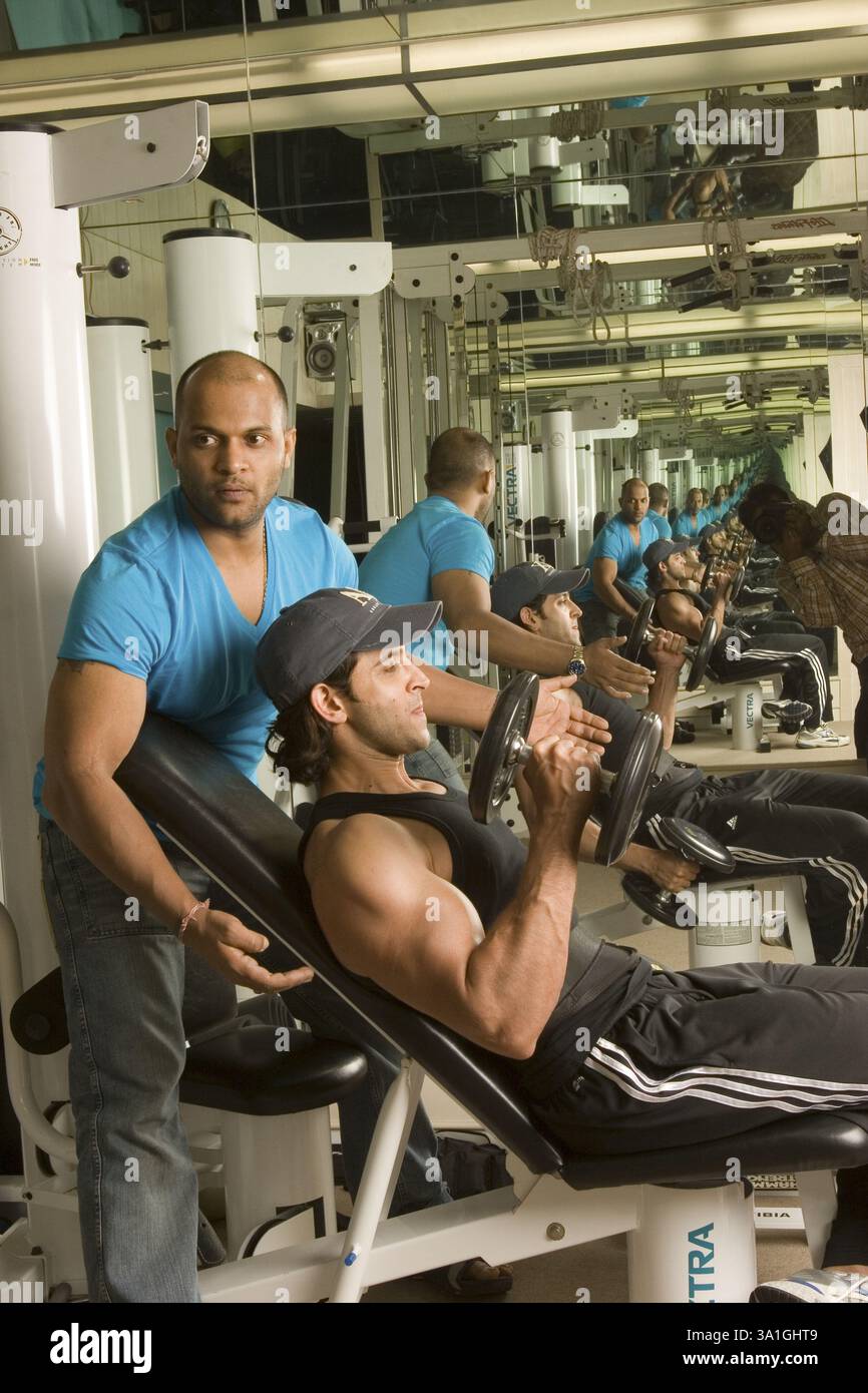 Bollywood Hindi film actor Hrithik Roshan with gym trainer Satya NO MR ...