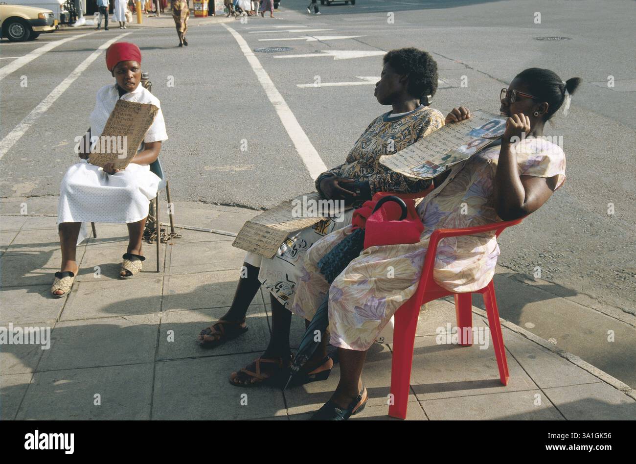 Beauticians advertising cosmetic treatments on street in Durban, South ...