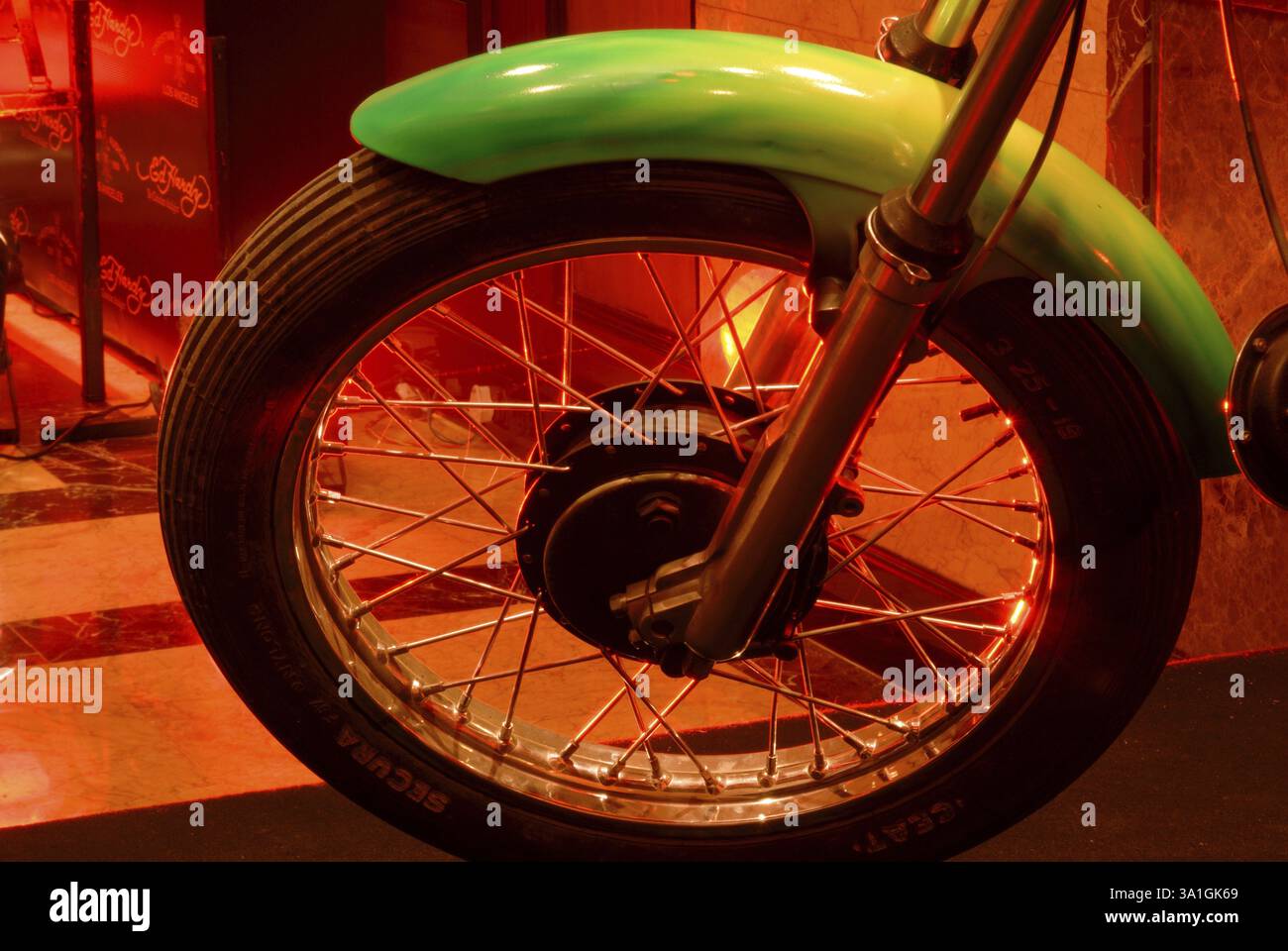 Motor bike, front wheel in the showcase, Bombay now Mumbai, Maharashtra ...