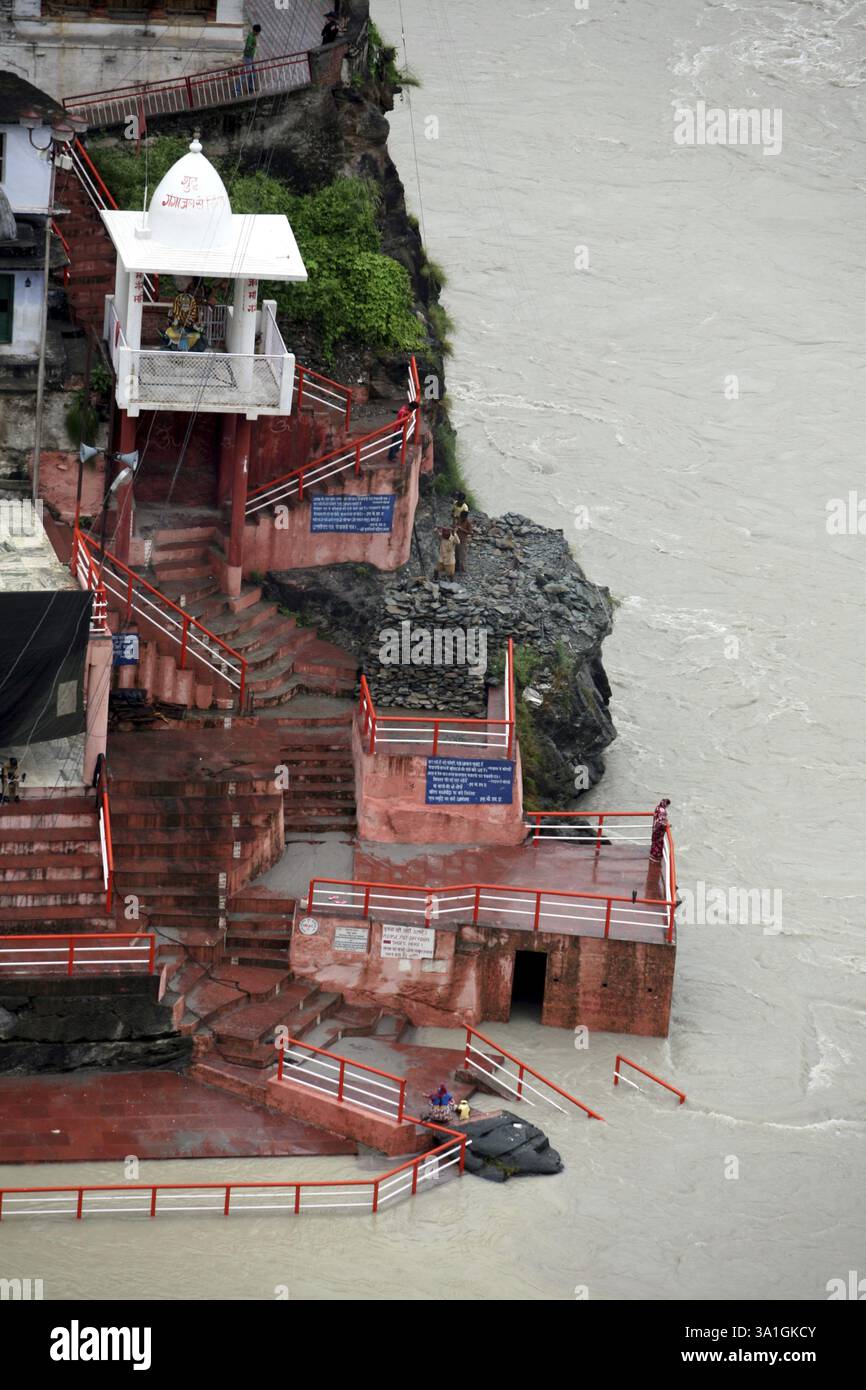 A temple at the confluence of the Alaknanda, the Bhagirathi where they ...
