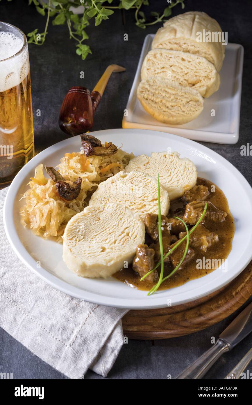 Original Czech dumpling with goulash Stock Photo - Alamy