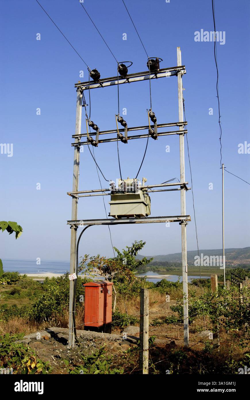 Electric transformer fixed on iron pole at Shrivardhan, Konkan coast ...