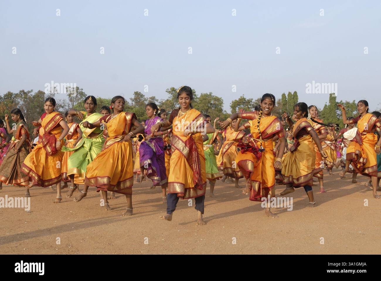 Women performing traditional Indian dance on ground for special ...