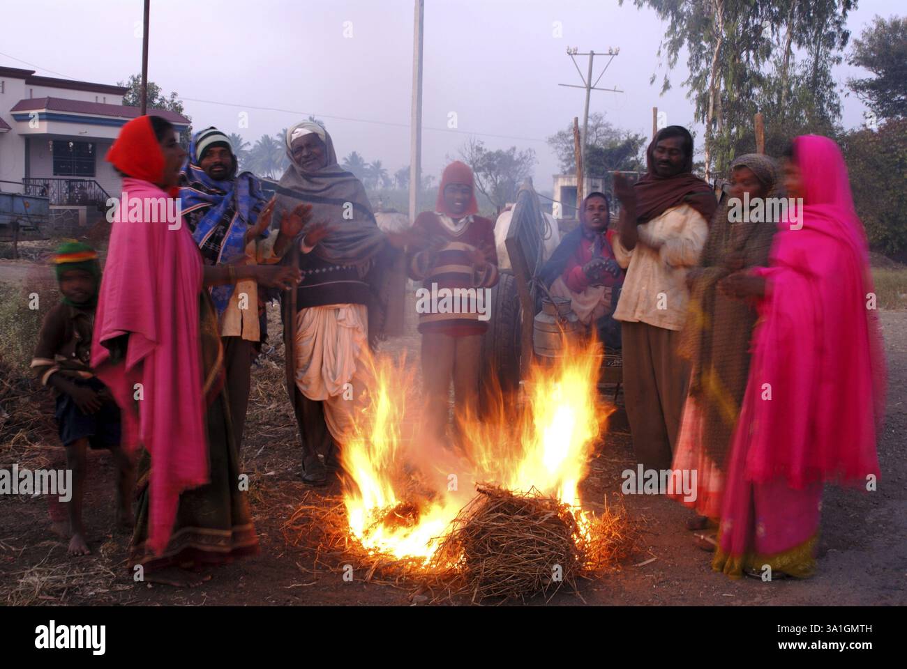 Fire camp, rural people warming themselves protect from cold, Sangli ...