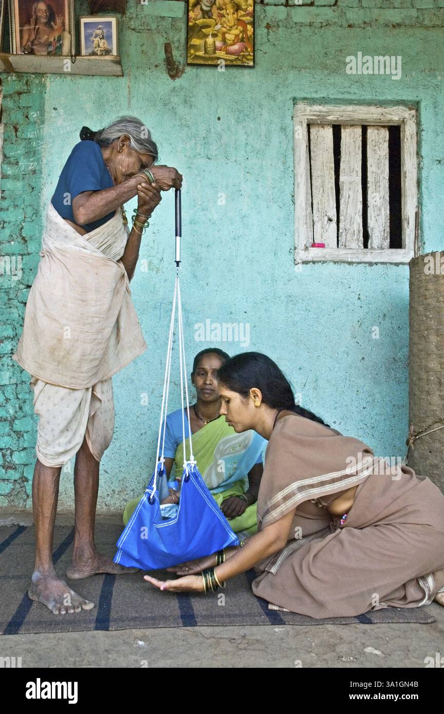 Woman health volunteer explaining village 'dai' traditional midwife use ...