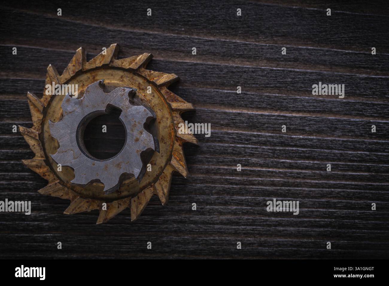 Grunge sharp milling cutter on vintage wooden board construction ...