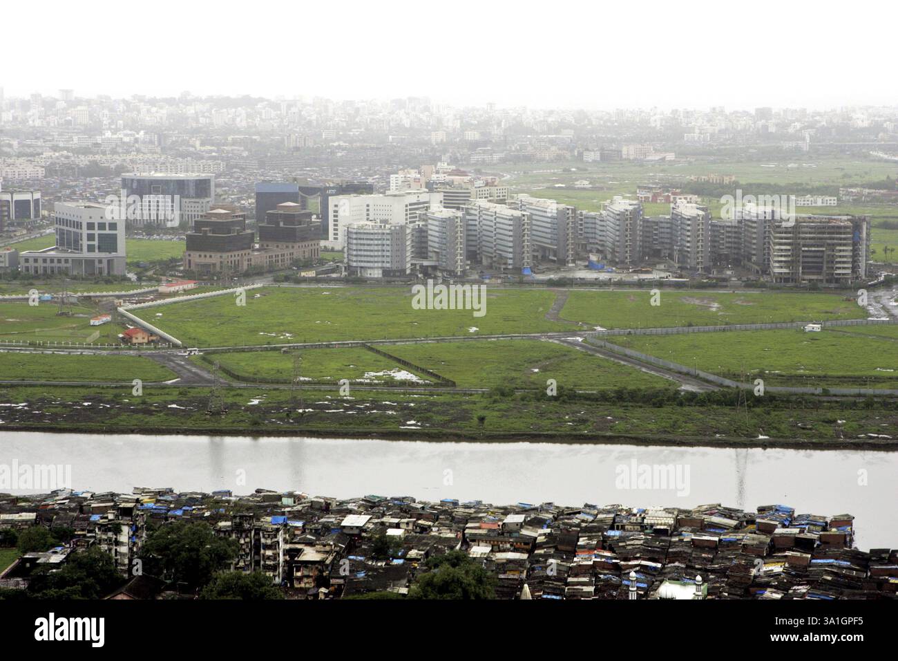 An aerial view of Bandra Kurla complex along Mithi River flowing ...