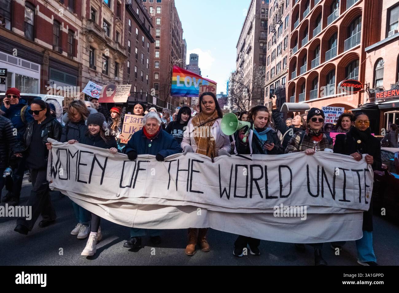 Transgender advocate Yanery Cruz leads the Women's Day March from ...