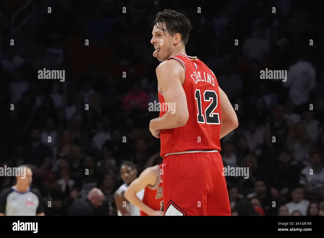Chicago Bulls forward Zach Collins (12) gestures after scoring during ...