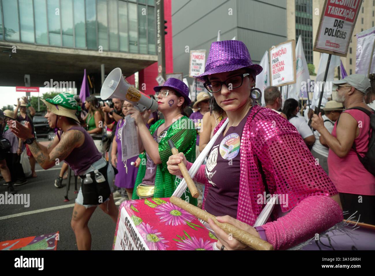 Women take part in a march to mark International Women's Day in Sao ...