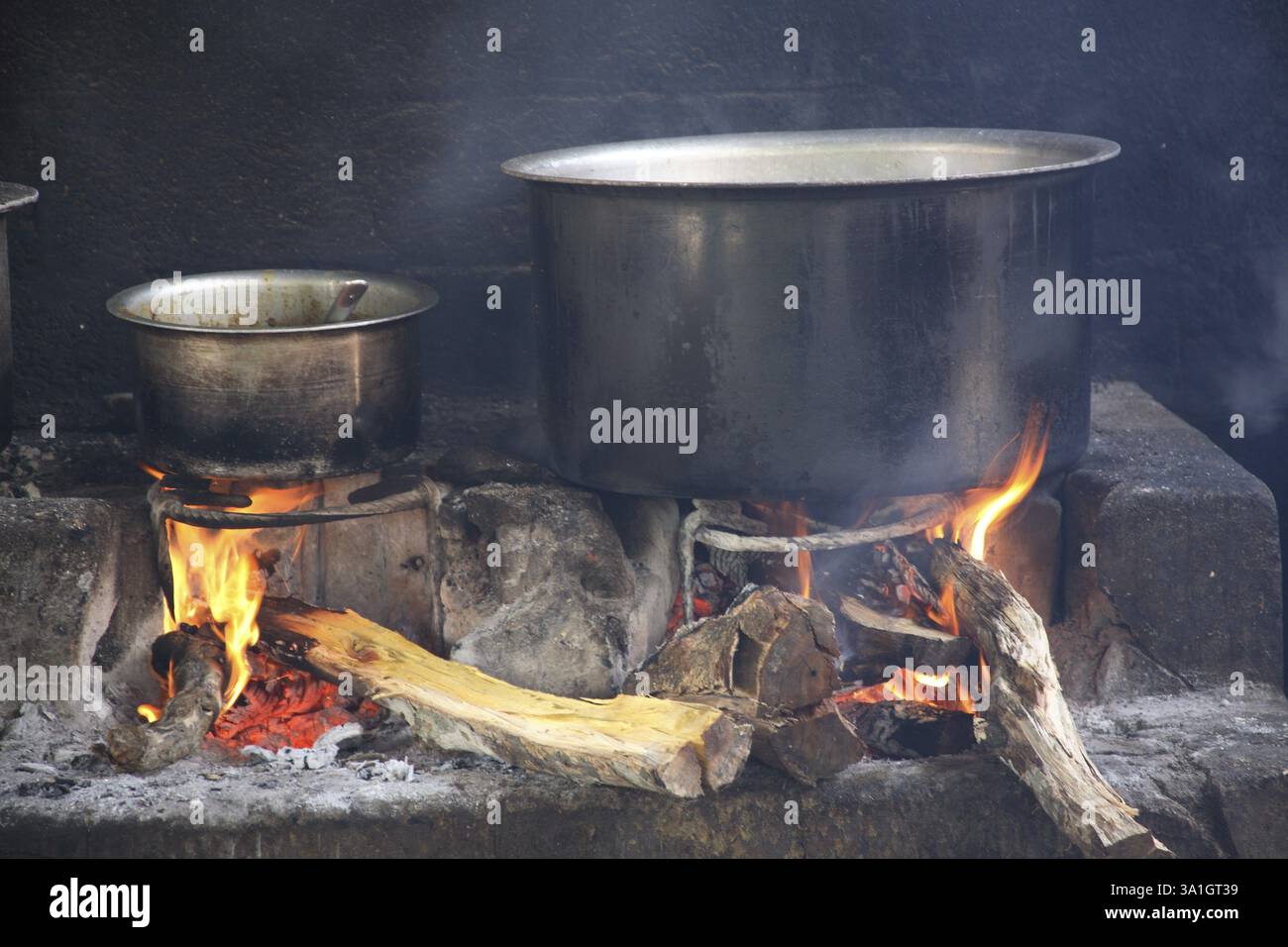 Pots on fire Stock Photo - Alamy