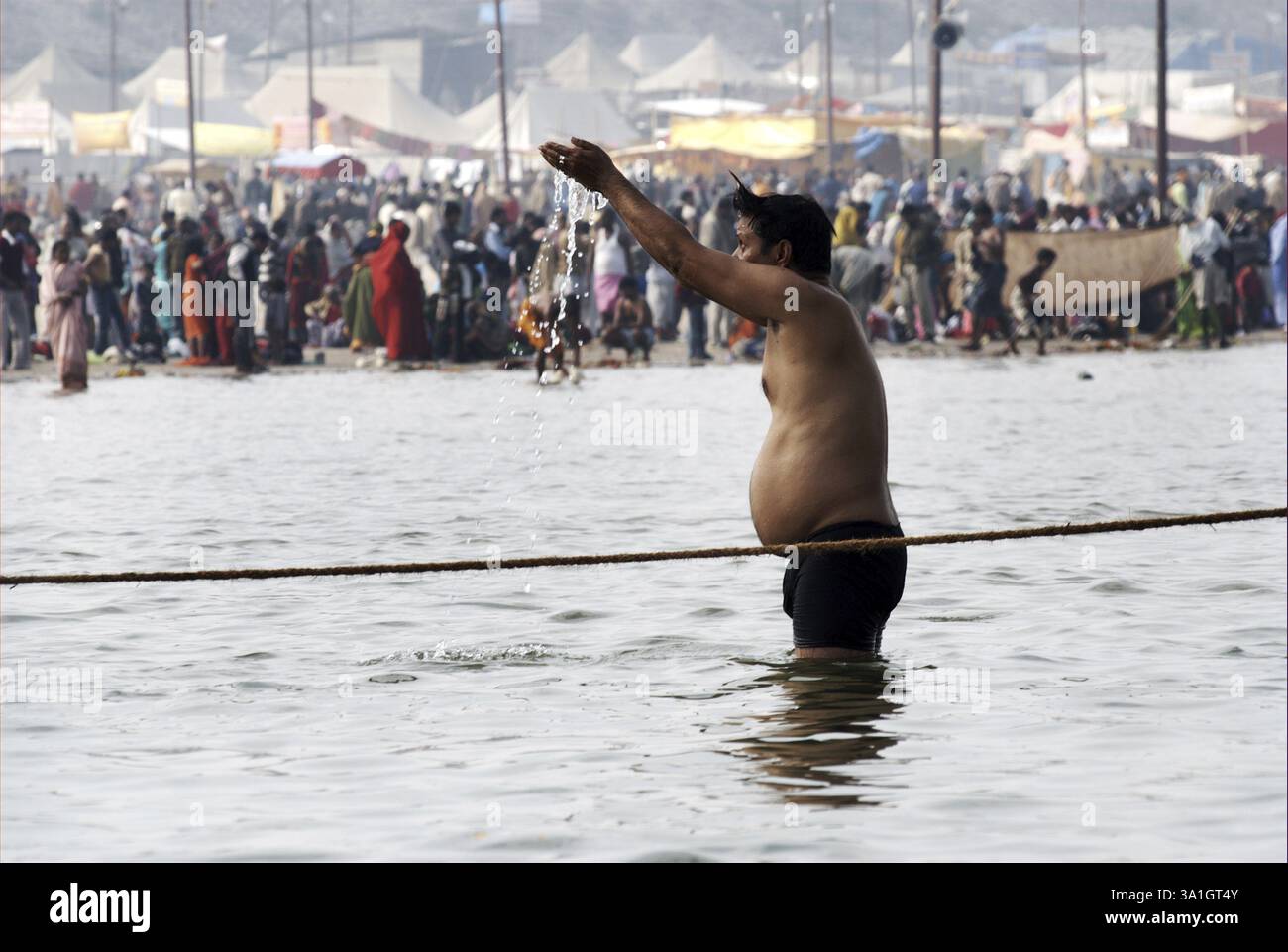 Pilgrims gather at the confluence of the Ganges, Yamuna and the ...