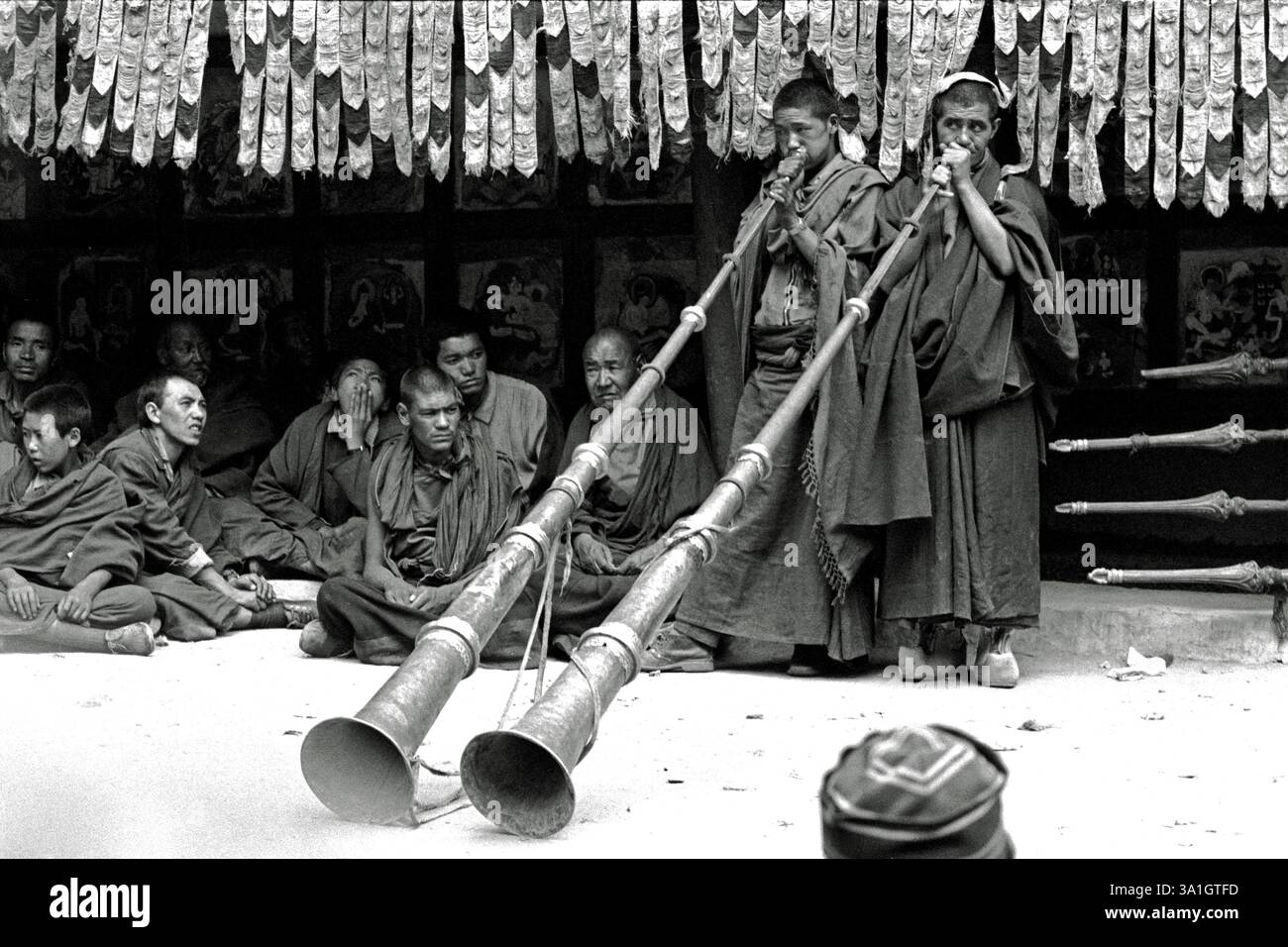 Two monks blowing the trumpets on Hemis festival at Hemis Gompa Ladakh ...