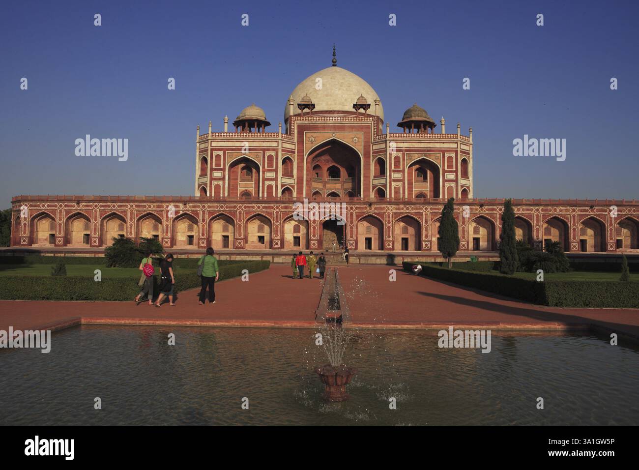 Tourists at Humayun's tomb built in 1570 made from red sandstone and ...