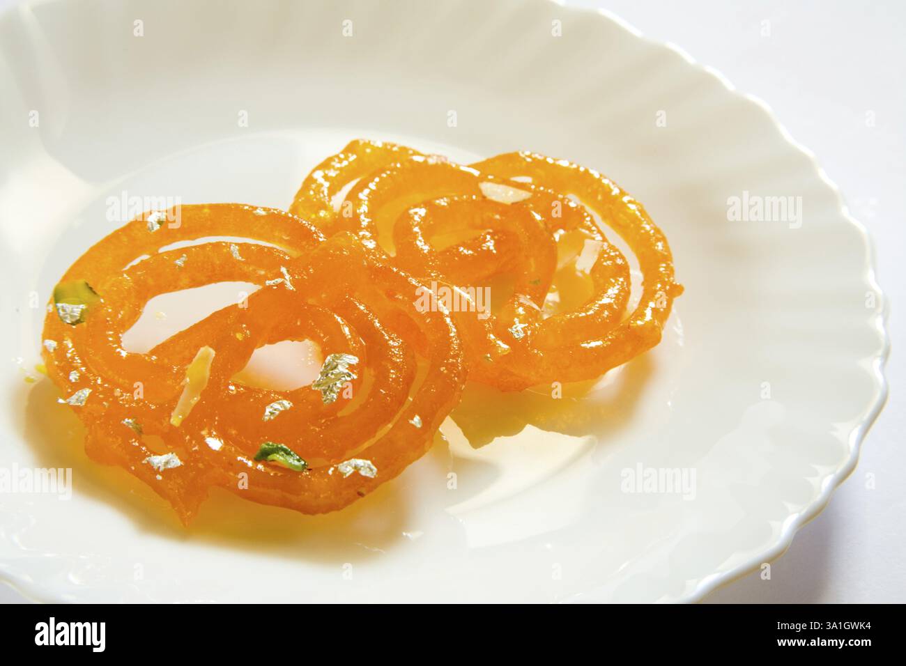 Indian sweet food Bonbon Confectionery Jalebee served in plate Stock ...