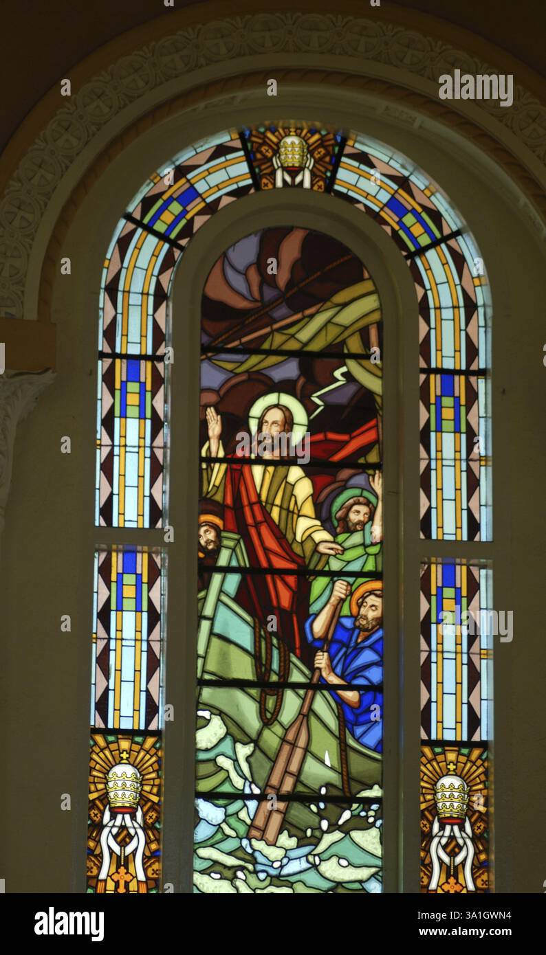 Stained glass of church showing picture of Jesus sleeping in boat Stock ...