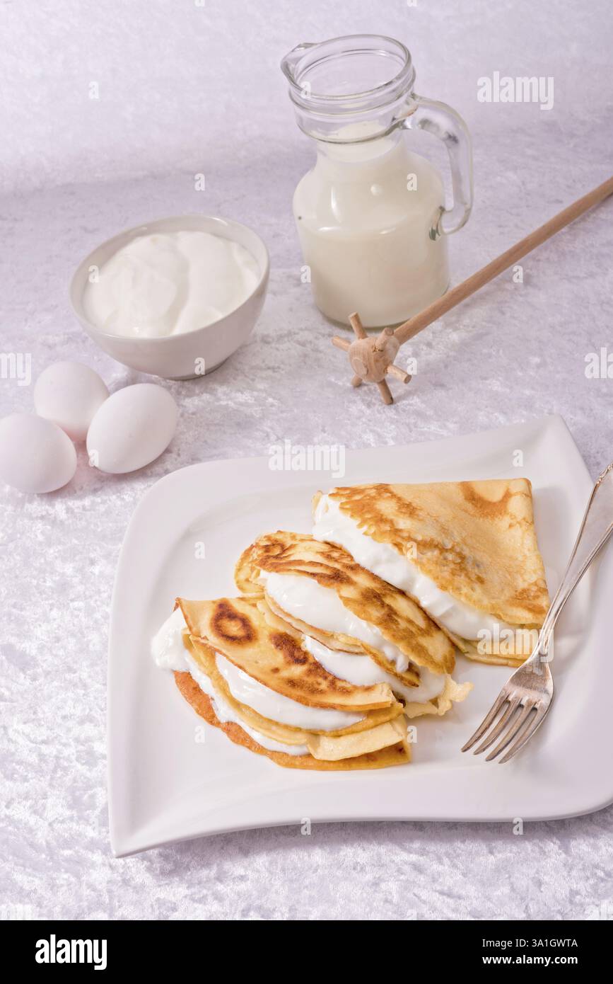 Egg cake with vanilla quark Stock Photo - Alamy