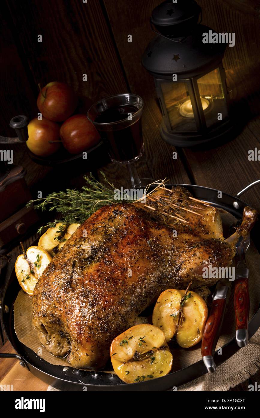 Duck on old Polish roasted with thyme and Apple Stock Photo - Alamy